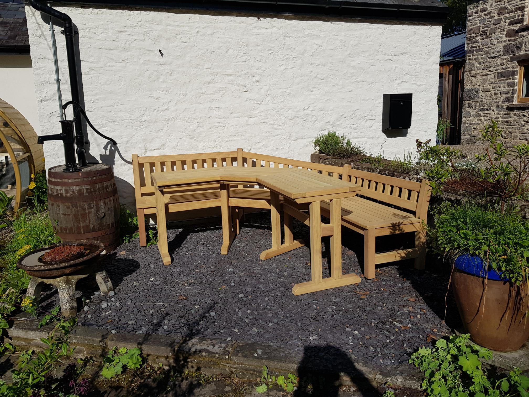 Bespoke corner angled wooden garden bench and table | Woodcraft UK