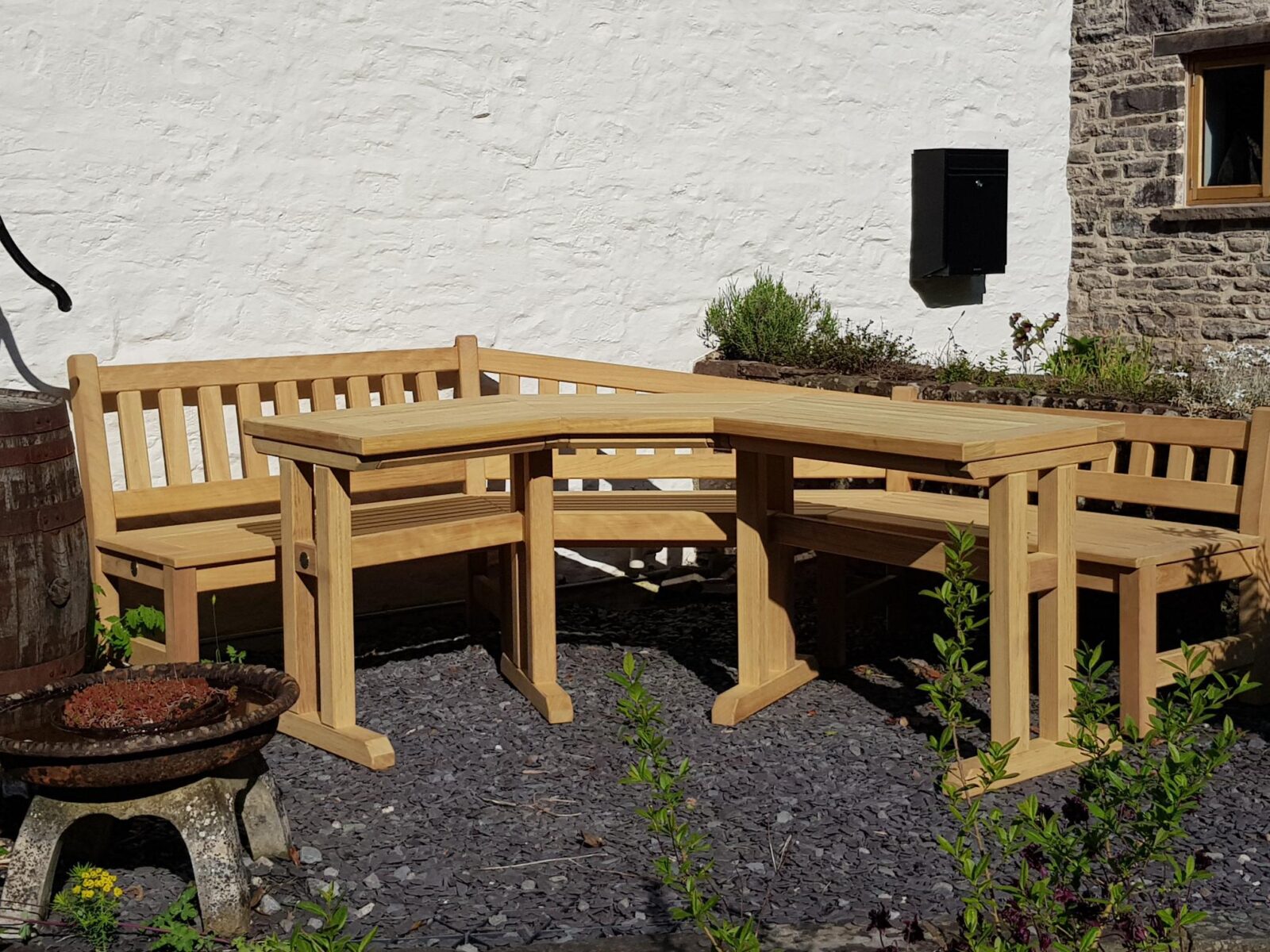 Bespoke corner angled wooden garden bench and table | Woodcraft UK